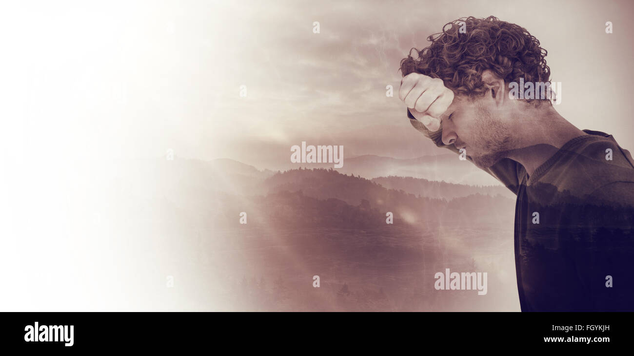 Composite image of depressed man over white background Stock Photo - Alamy