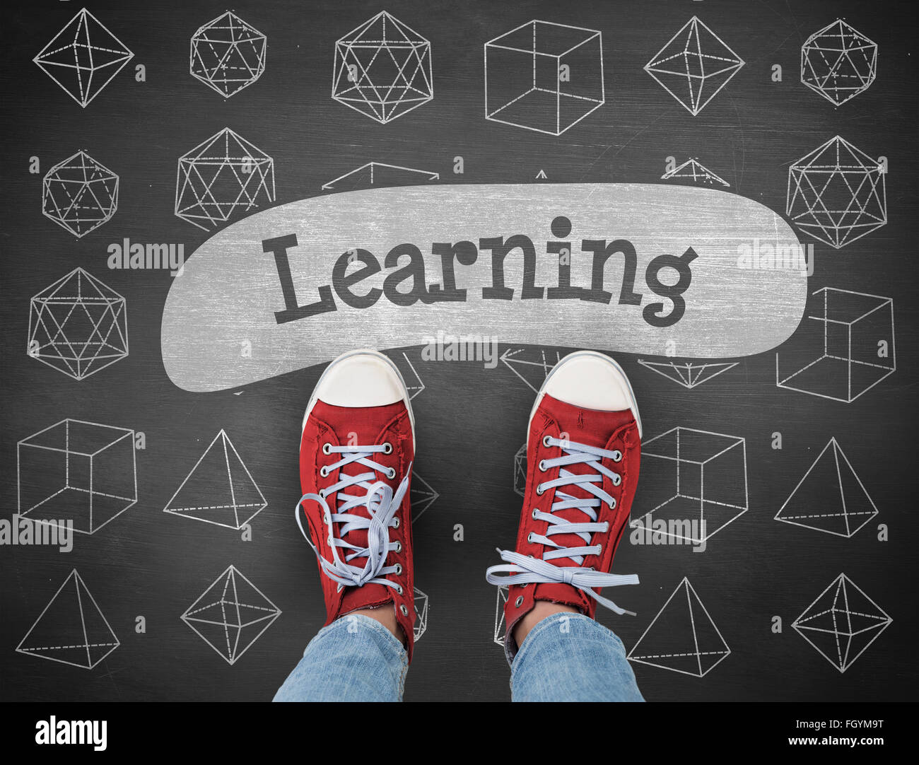 Learning against black background Stock Photo - Alamy