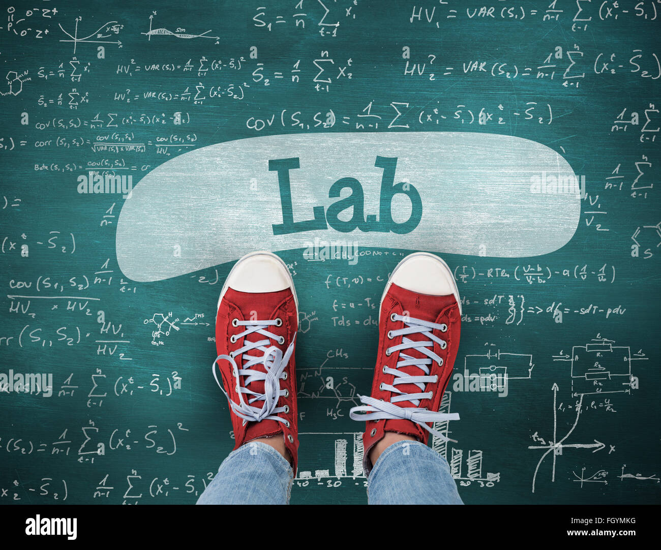 Lab against green chalkboard Stock Photo - Alamy