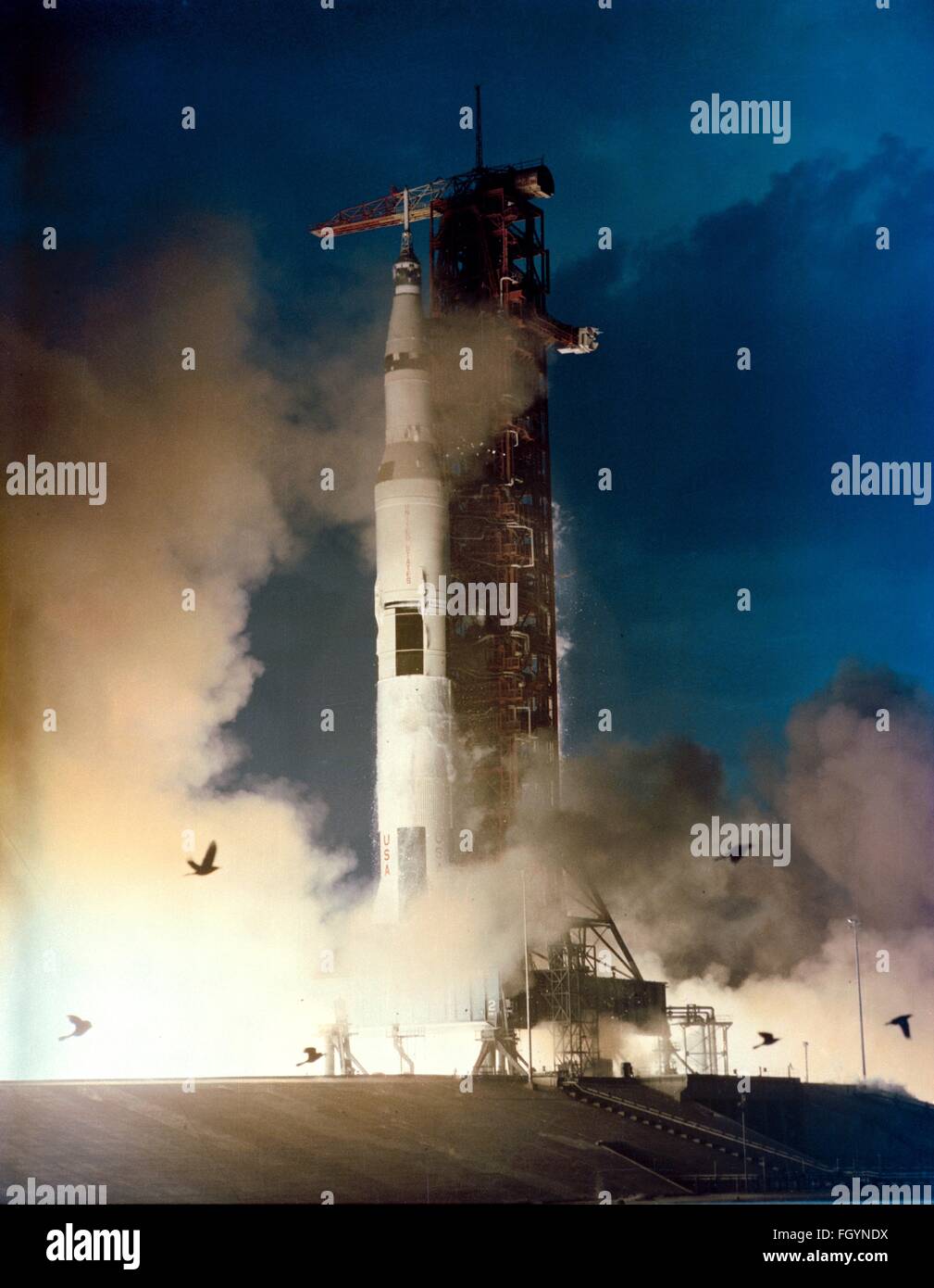 The Saturn V rocket carrying the Apollo 14 spacecraft blasts off from launch pad A at the ...