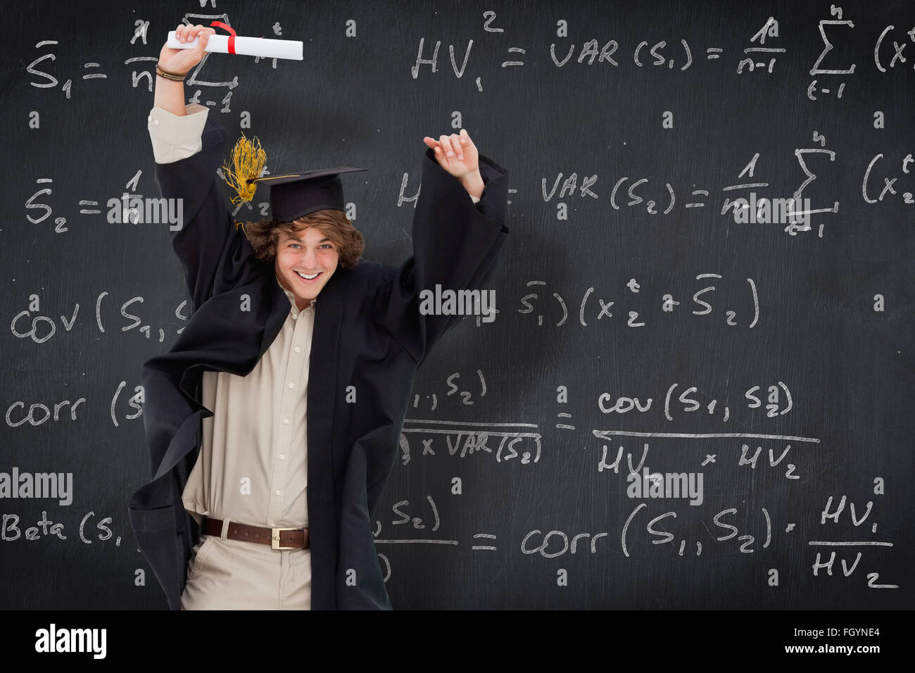 Composite image of male student in graduate robe jumping Stock Photo ...