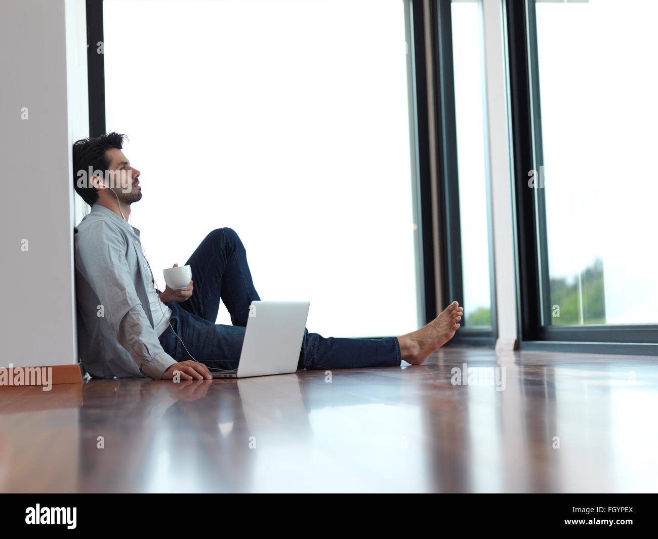 working on laptop computer from home Stock Photo - Alamy