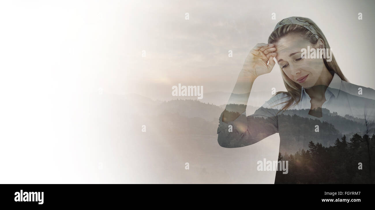 Composite image of upset woman touching forehead Stock Photo - Alamy