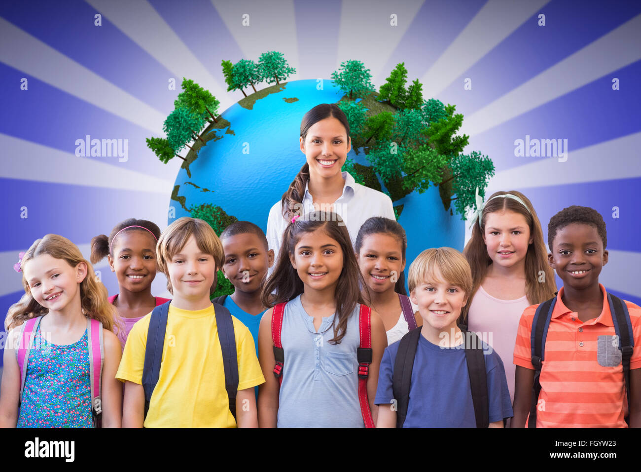 Composite image of cute pupils smiling at camera in the hall Stock ...