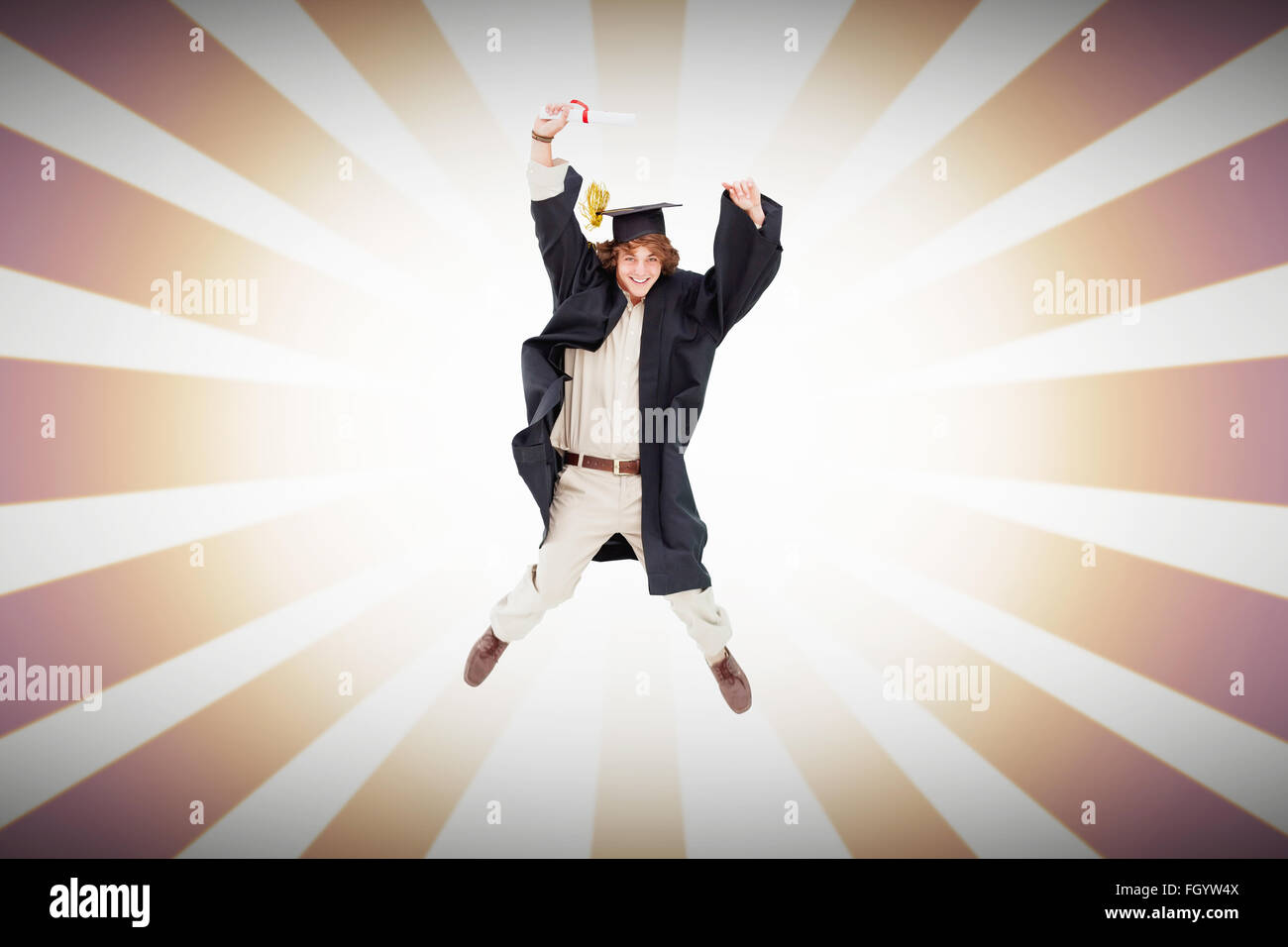 Happy jumping graduate holding diploma hi-res stock photography and ...