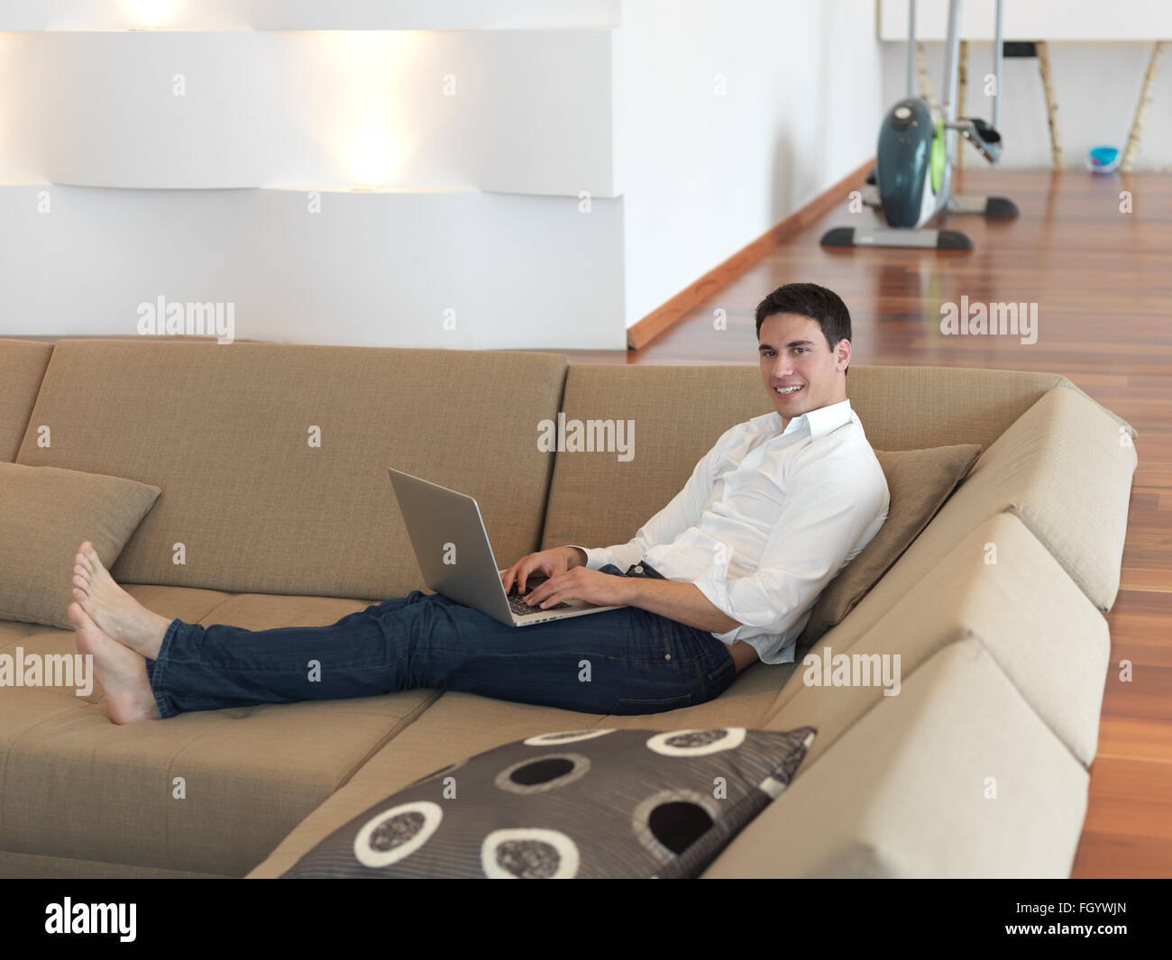 working on laptop computer from home Stock Photo - Alamy