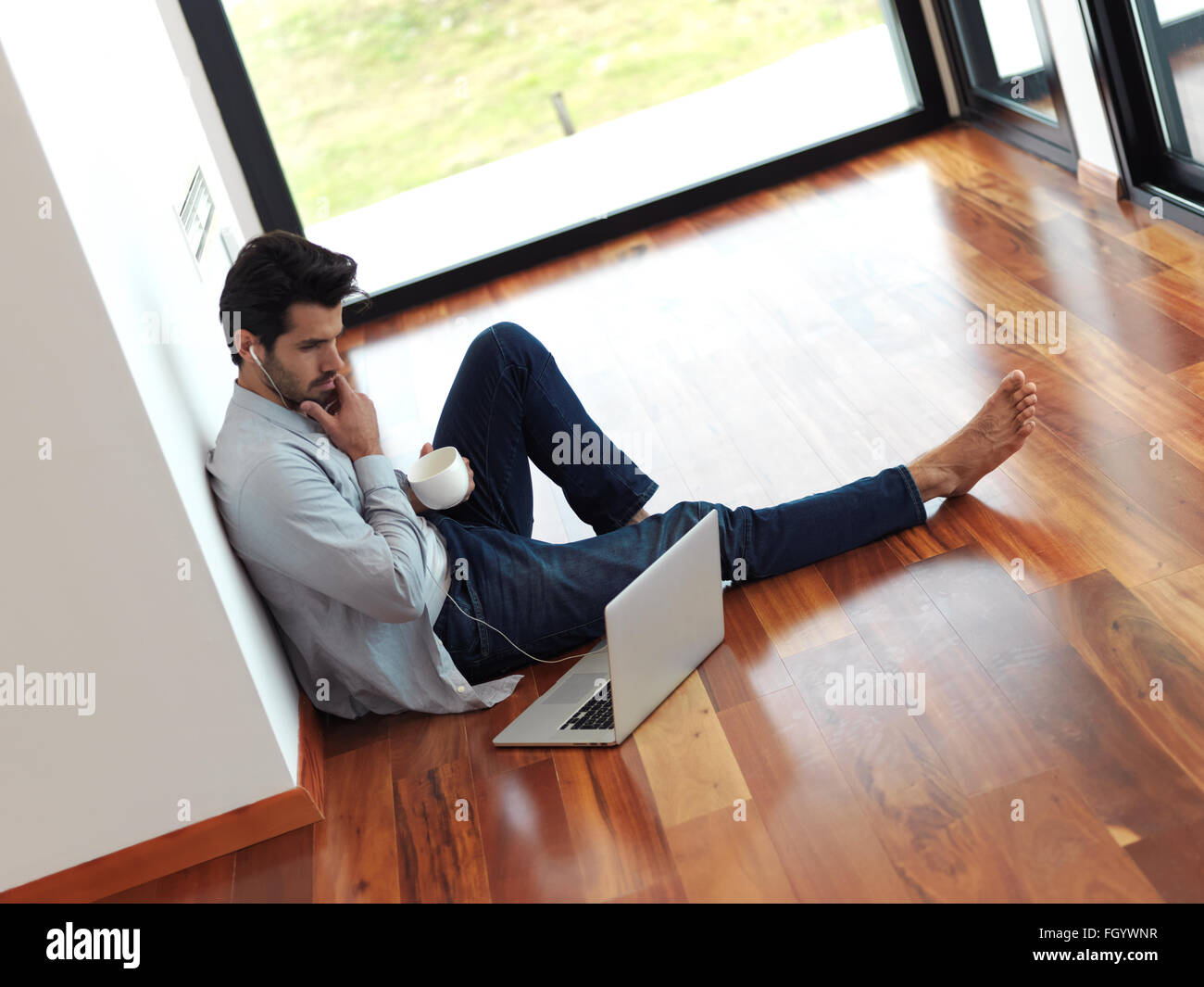 working on laptop computer from home Stock Photo - Alamy