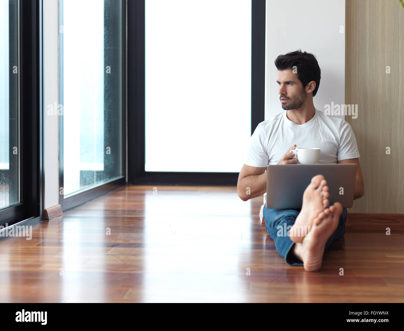 working on laptop computer from home Stock Photo - Alamy