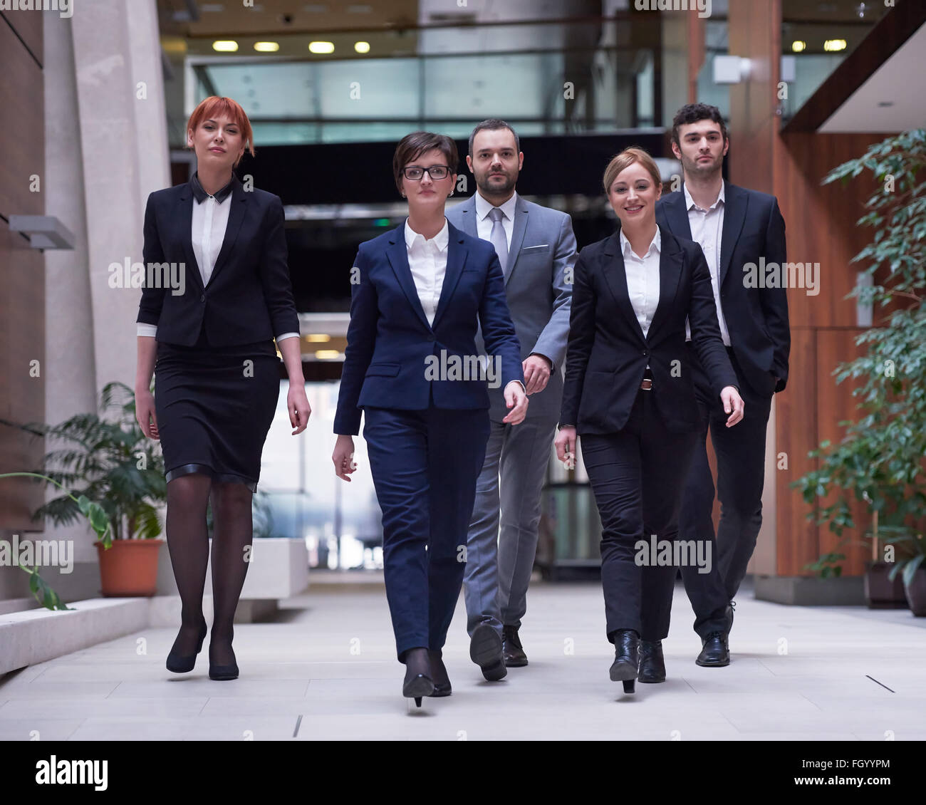 business people team walking Stock Photo - Alamy