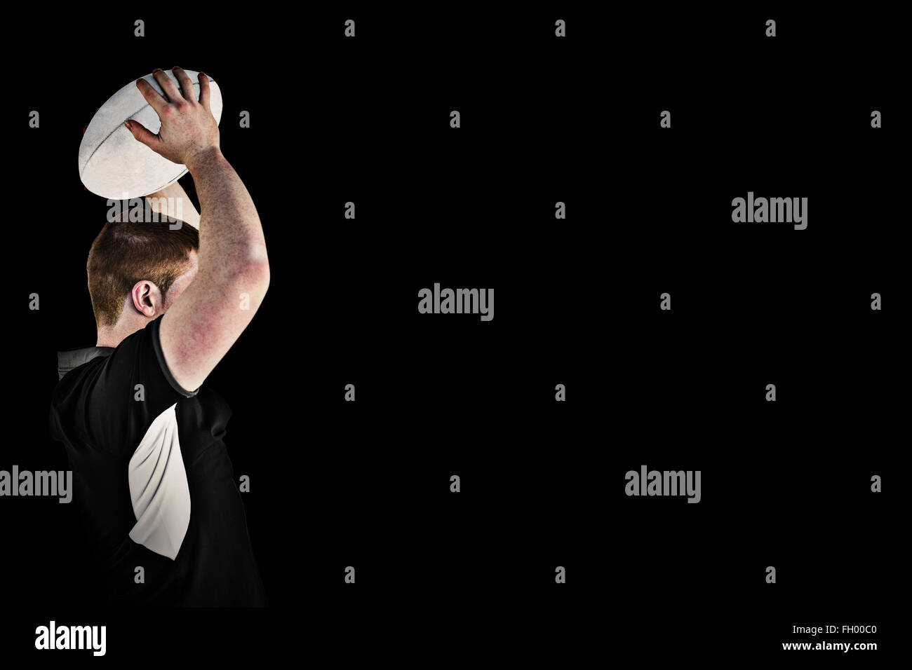 Composite image of rugby player about to throw a rugby ball Stock Photo ...