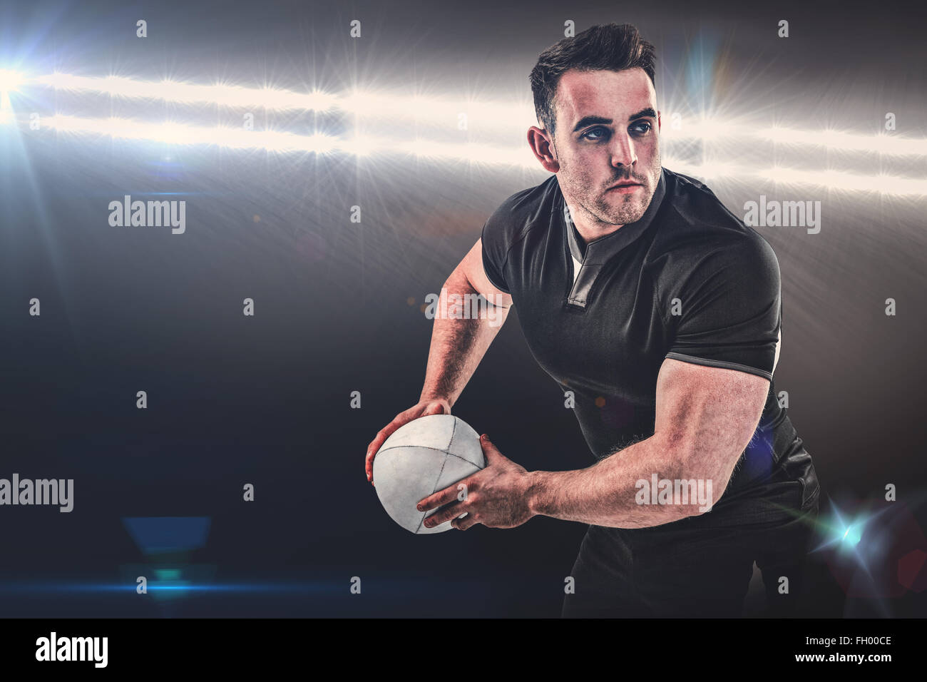Composite image of rugby player throwing the ball Stock Photo - Alamy