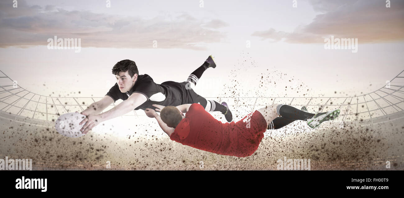 Composite image of a rugby player scoring a try Stock Photo - Alamy