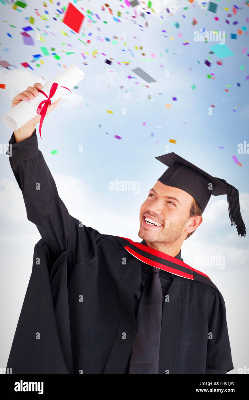 Composite image of happy attractive boy celebrating his graduation ...