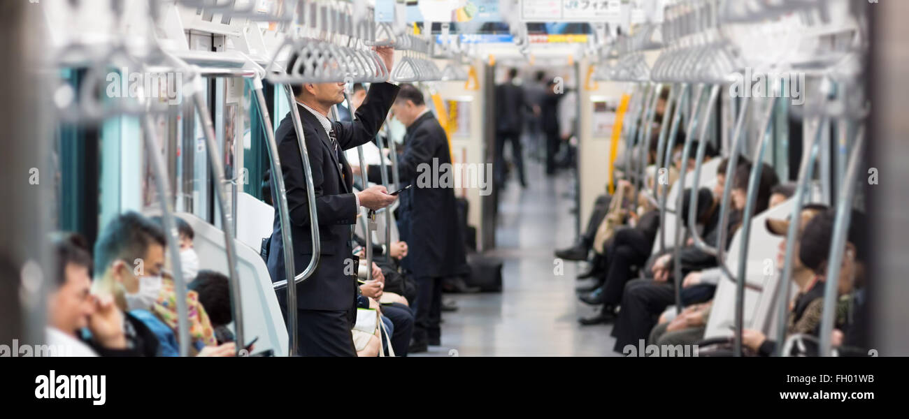 Passengers traveling by Tokyo metro Stock Photo - Alamy