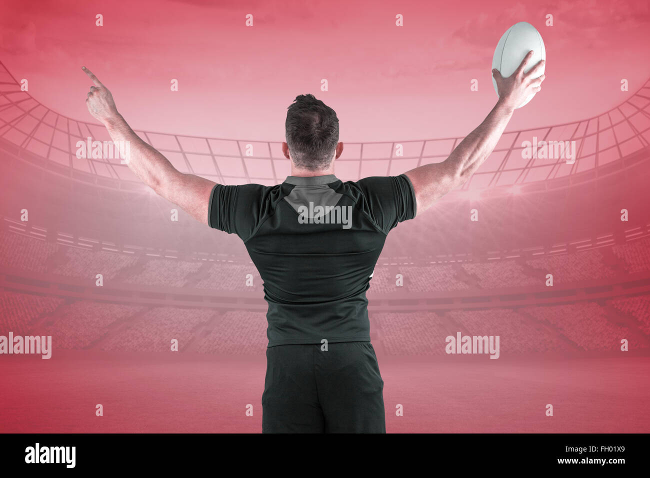 Composite image of rugby player celebrating with the ball Stock Photo ...