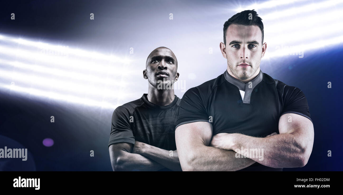 Composite image of tough rugby player looking at camera Stock Photo - Alamy