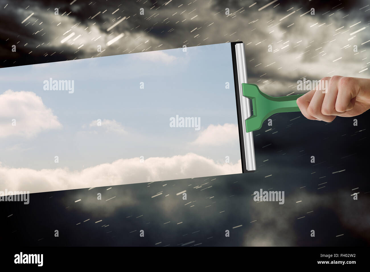 Composite image of hand using wiper Stock Photo - Alamy