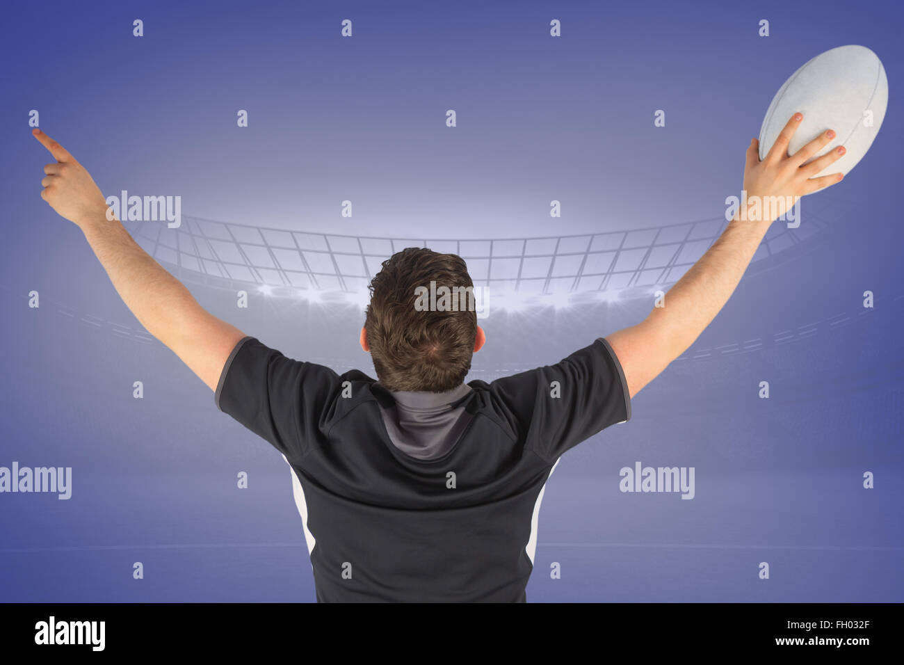 Composite image of back turned rugby player gesturing victory Stock ...