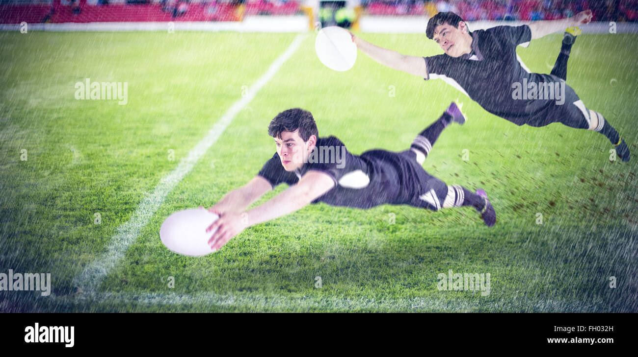 Composite image of a rugby player scoring a try Stock Photo - Alamy