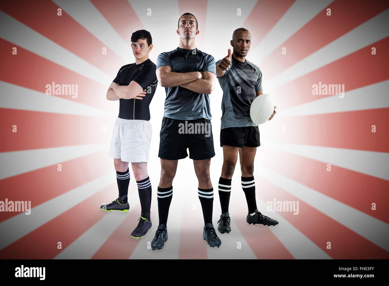 Composite image of tough rugby players Stock Photo - Alamy