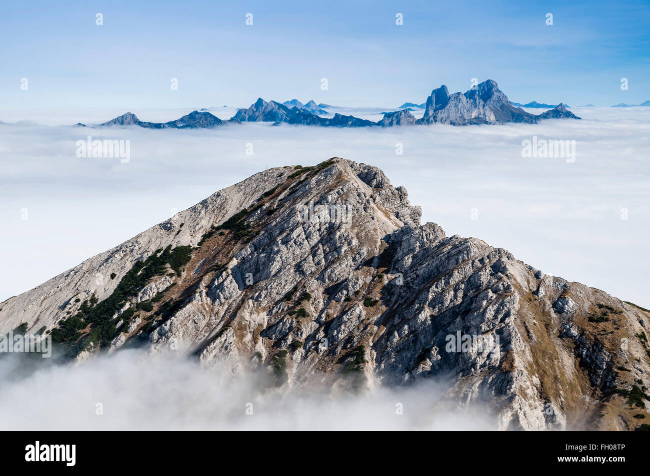 Summit of Ronenspitze, seen from mount Ponten, sea of fog over valley ...