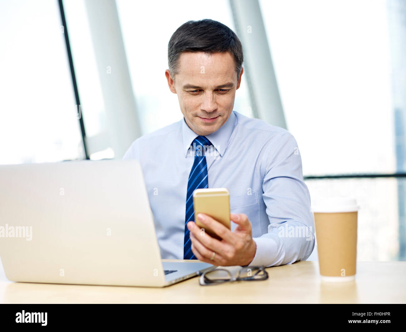 corporate person working in office Stock Photo - Alamy