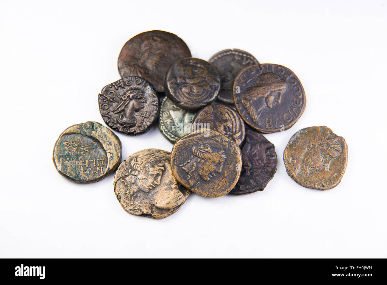 A lot of old coins with portraits of kings on a white background Stock ...