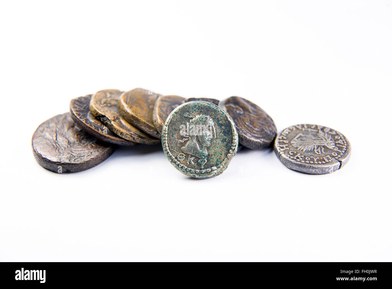 A lot of old coins with portraits of kings on a white background Stock ...