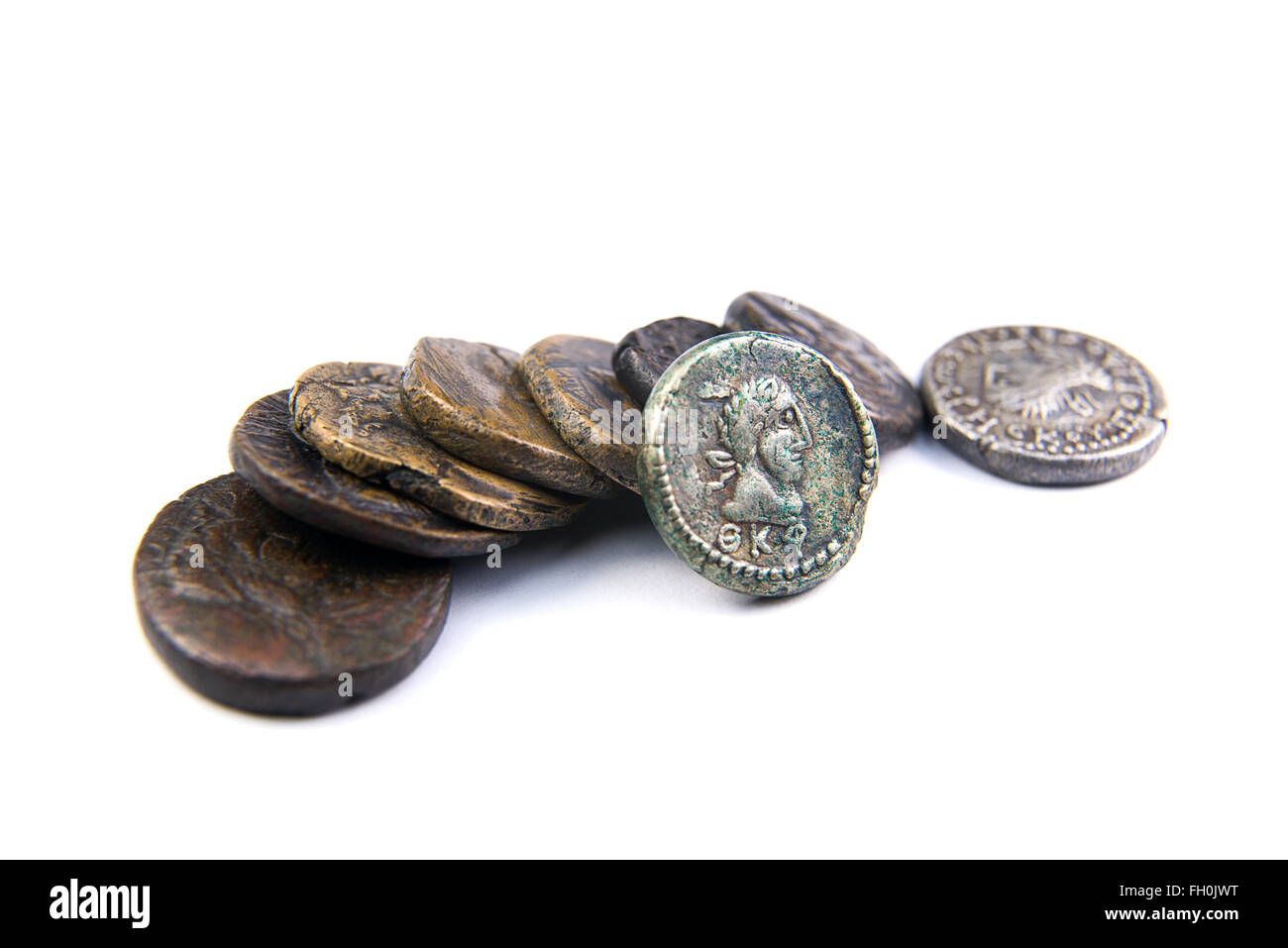 A lot of old coins with portraits of kings on a white background Stock ...