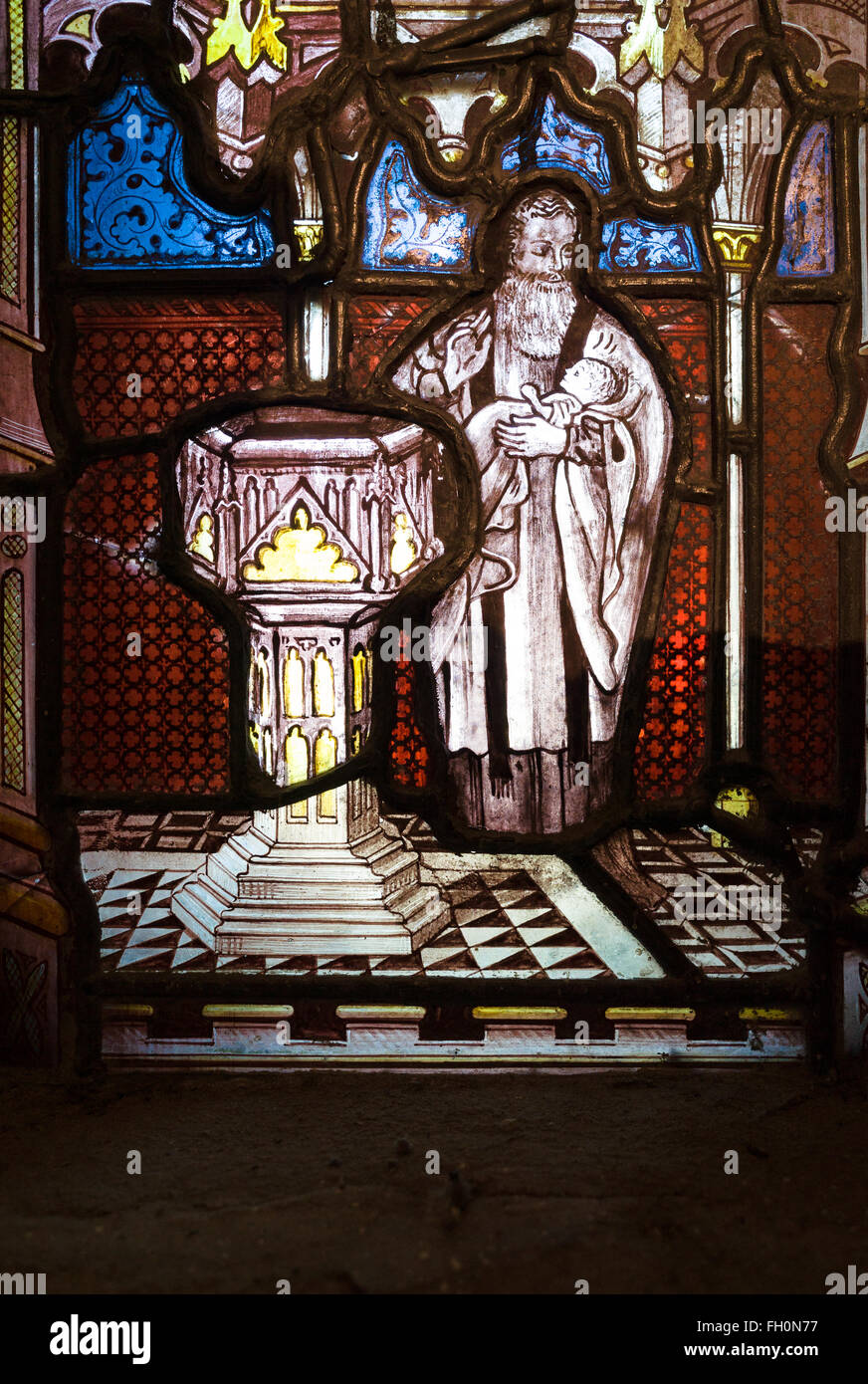 Stained glass window at the medieval church (dating from 1210) of Holy ...