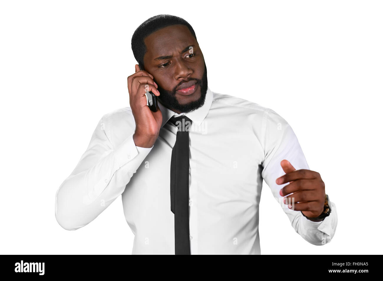 Afroamerican seriously answer the phone Stock Photo - Alamy
