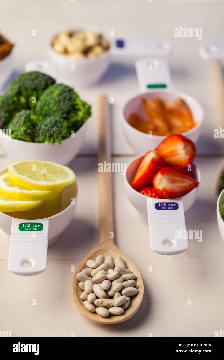 Portion cups of healthy ingredients Stock Photo - Alamy