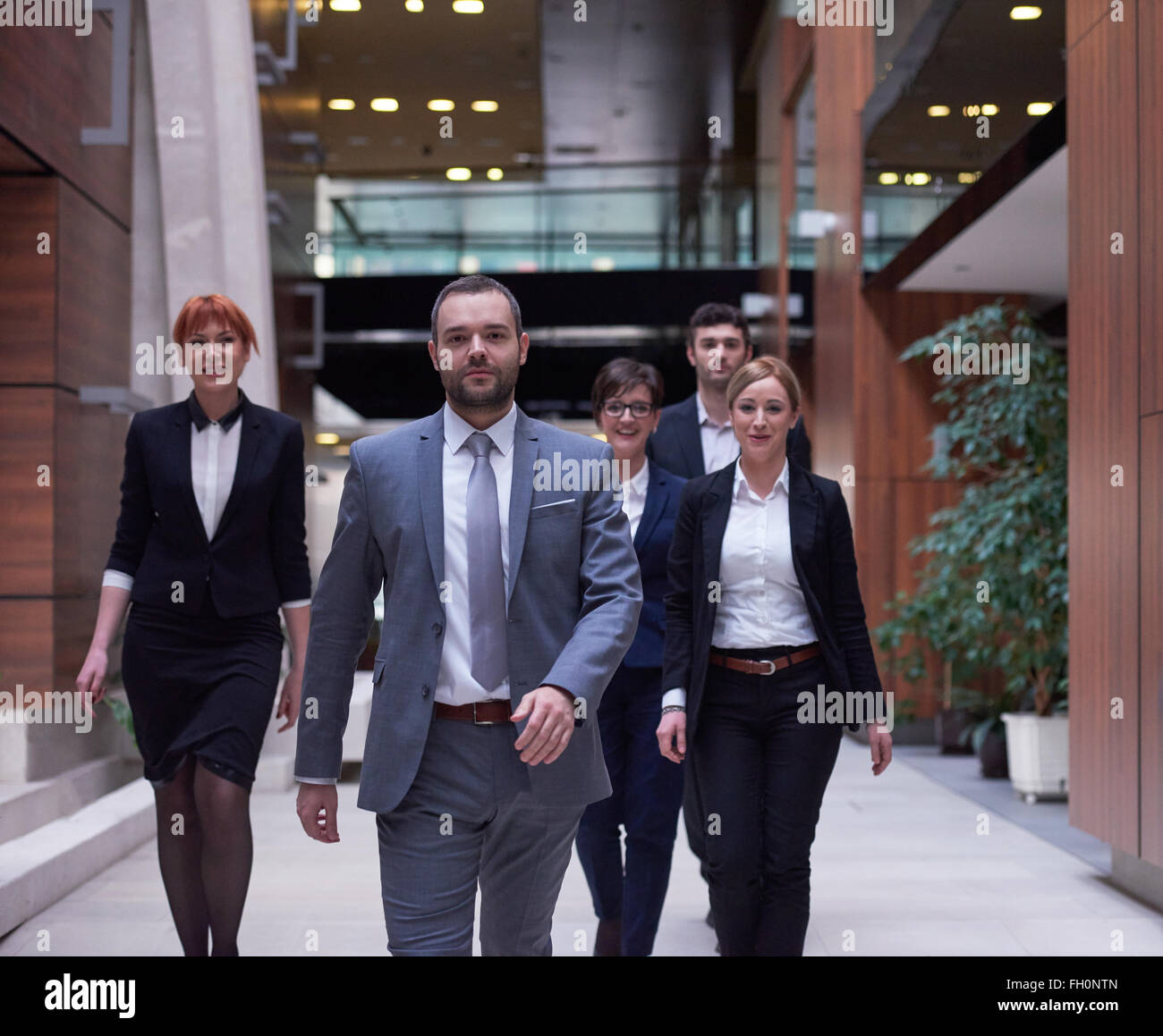 business people team walking Stock Photo - Alamy