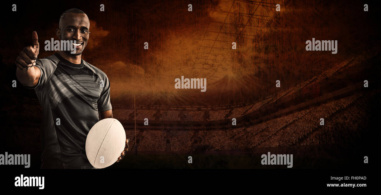 Composite image of portrait of confident rugby player smiling and ...