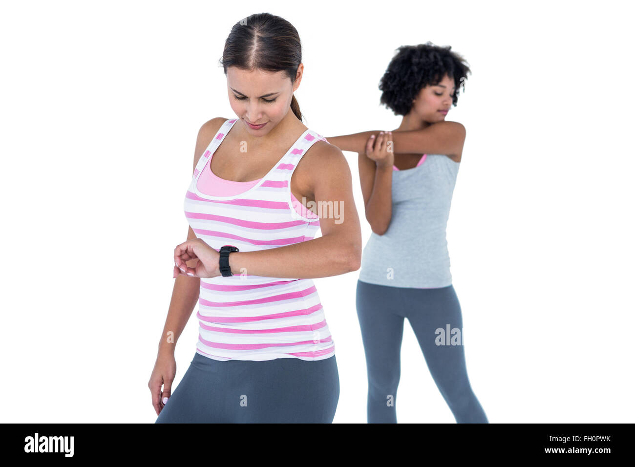 Woman checking time on wristwatch Stock Photo - Alamy