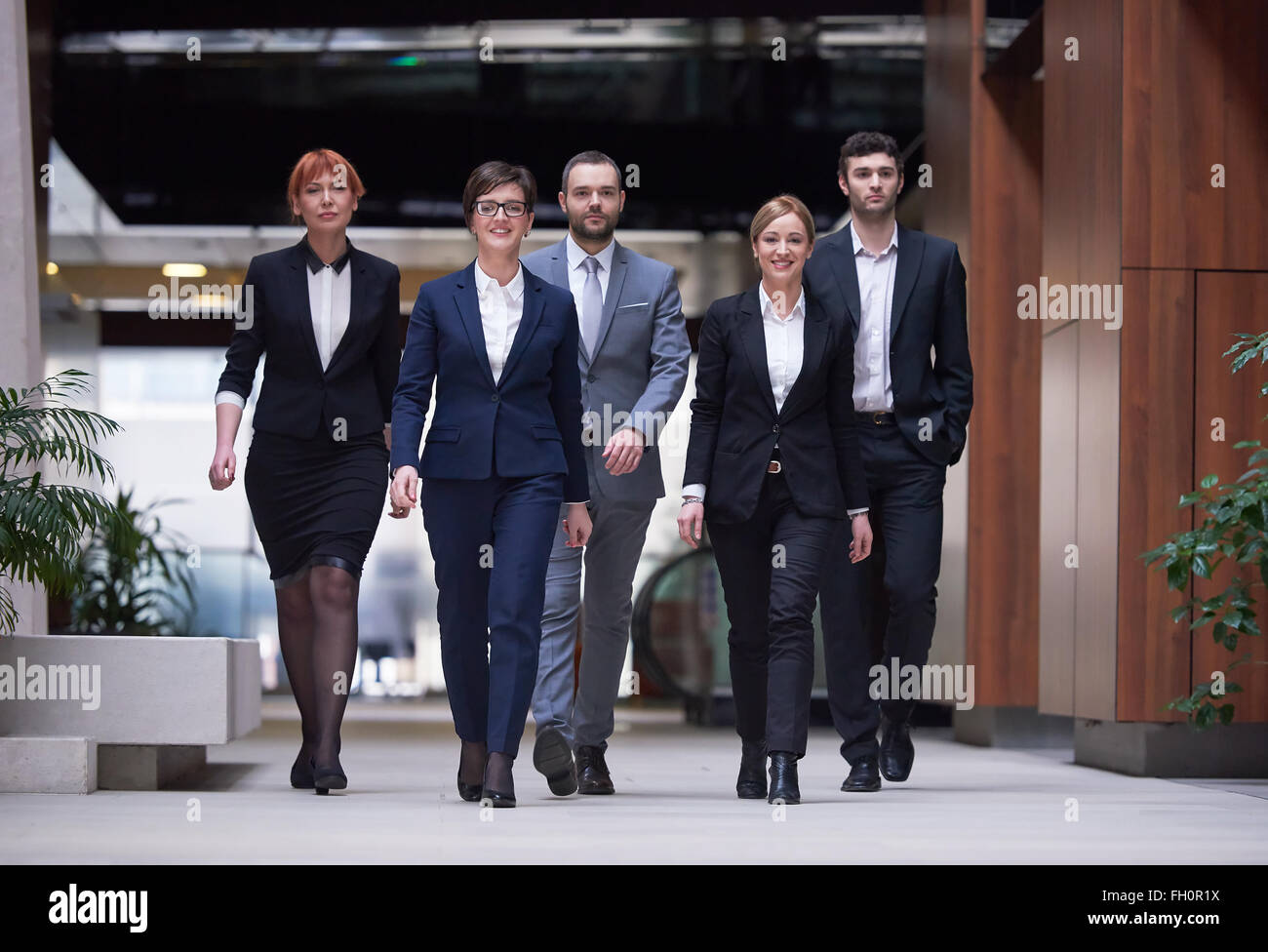 business people team walking Stock Photo - Alamy