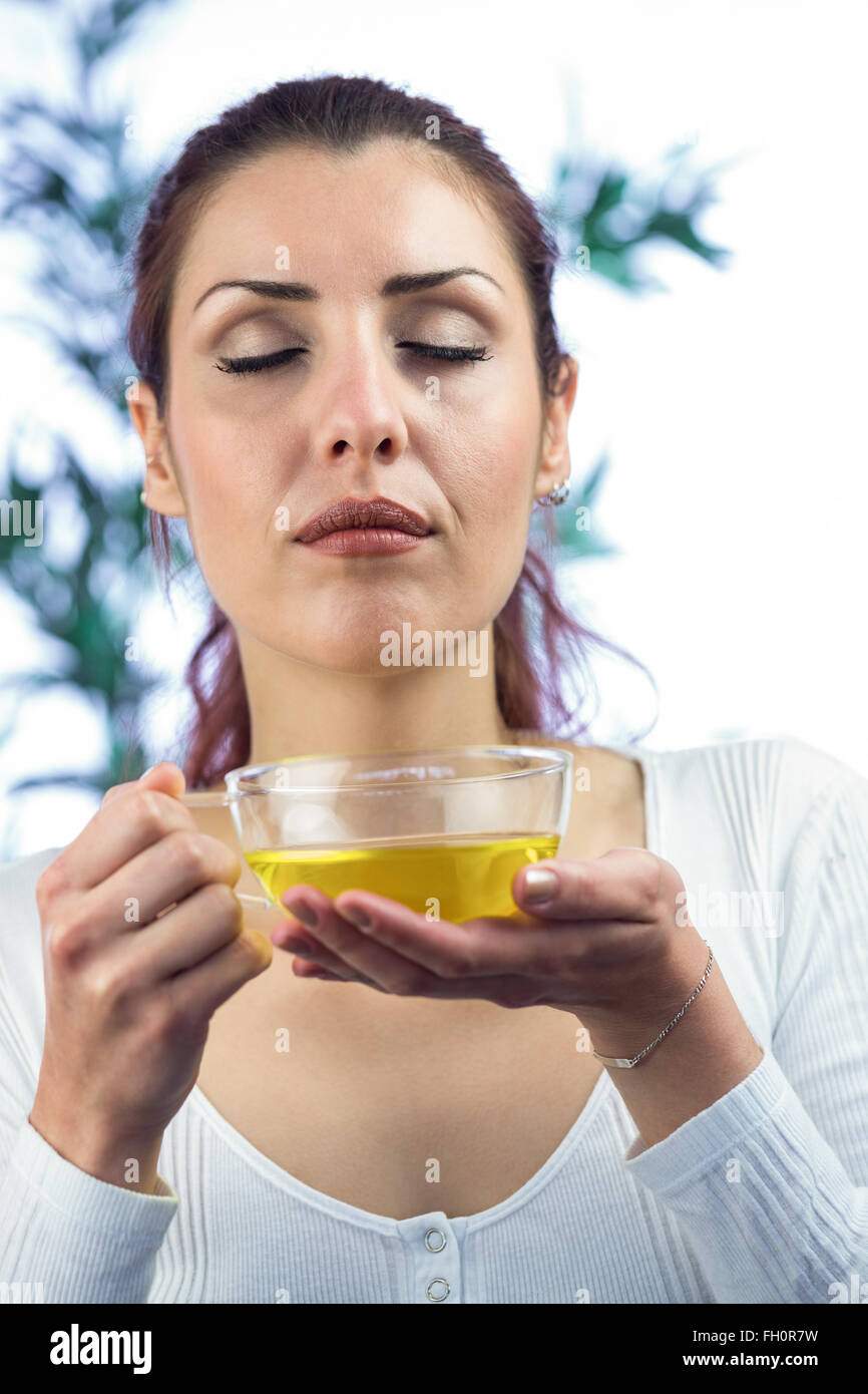 Woman holding herbal tea Stock Photo - Alamy