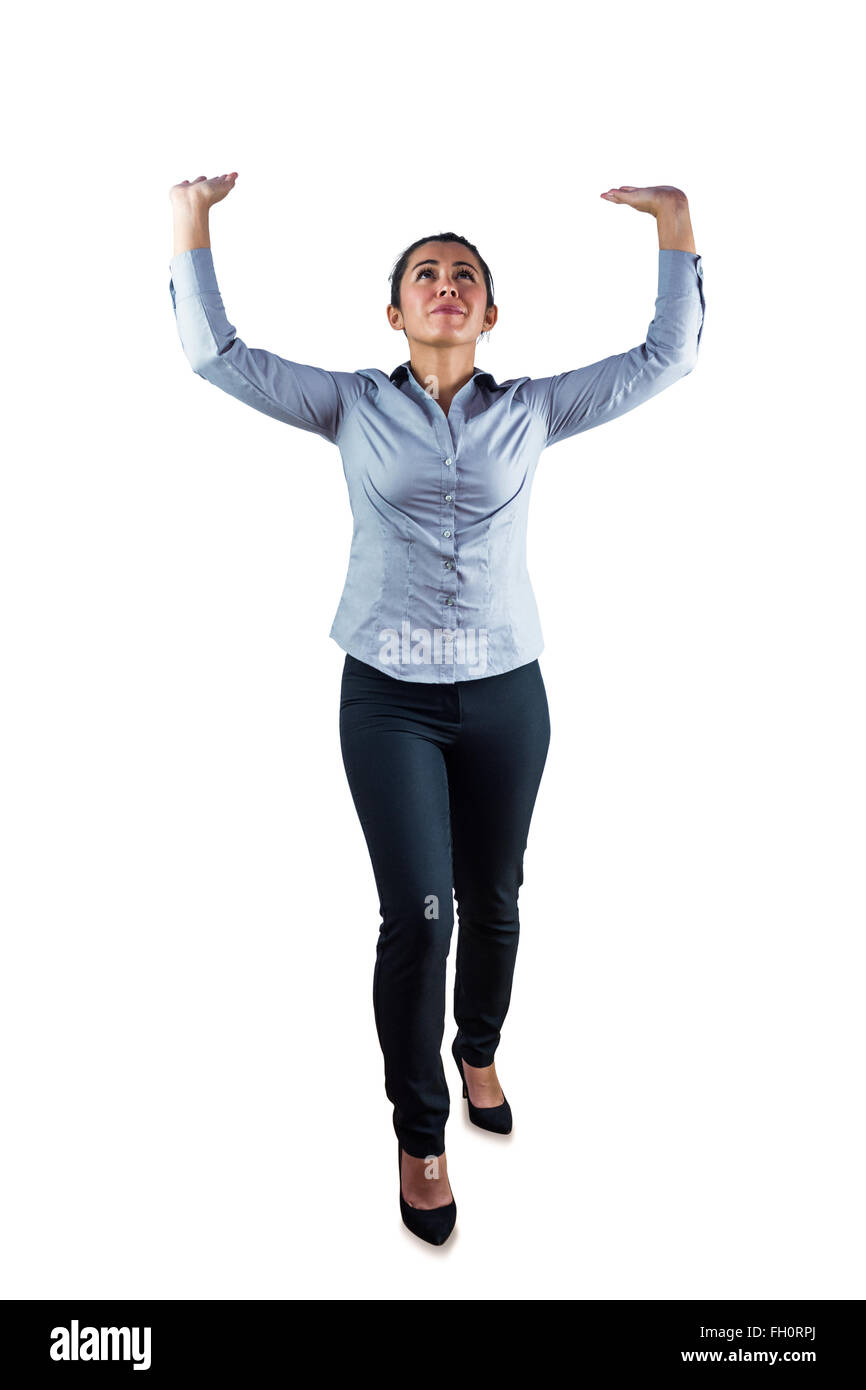 Woman with her hands and arms raised upwards Stock Photo - Alamy