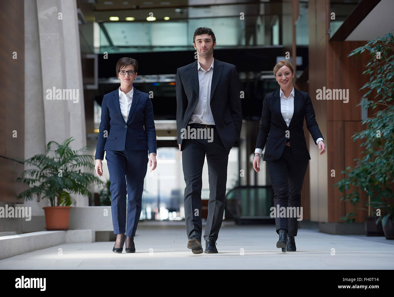 business people team walking Stock Photo - Alamy