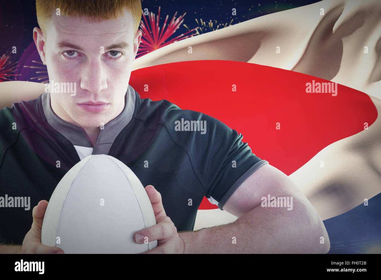 Composite image of rugby player holding a rugby ball Stock Photo - Alamy