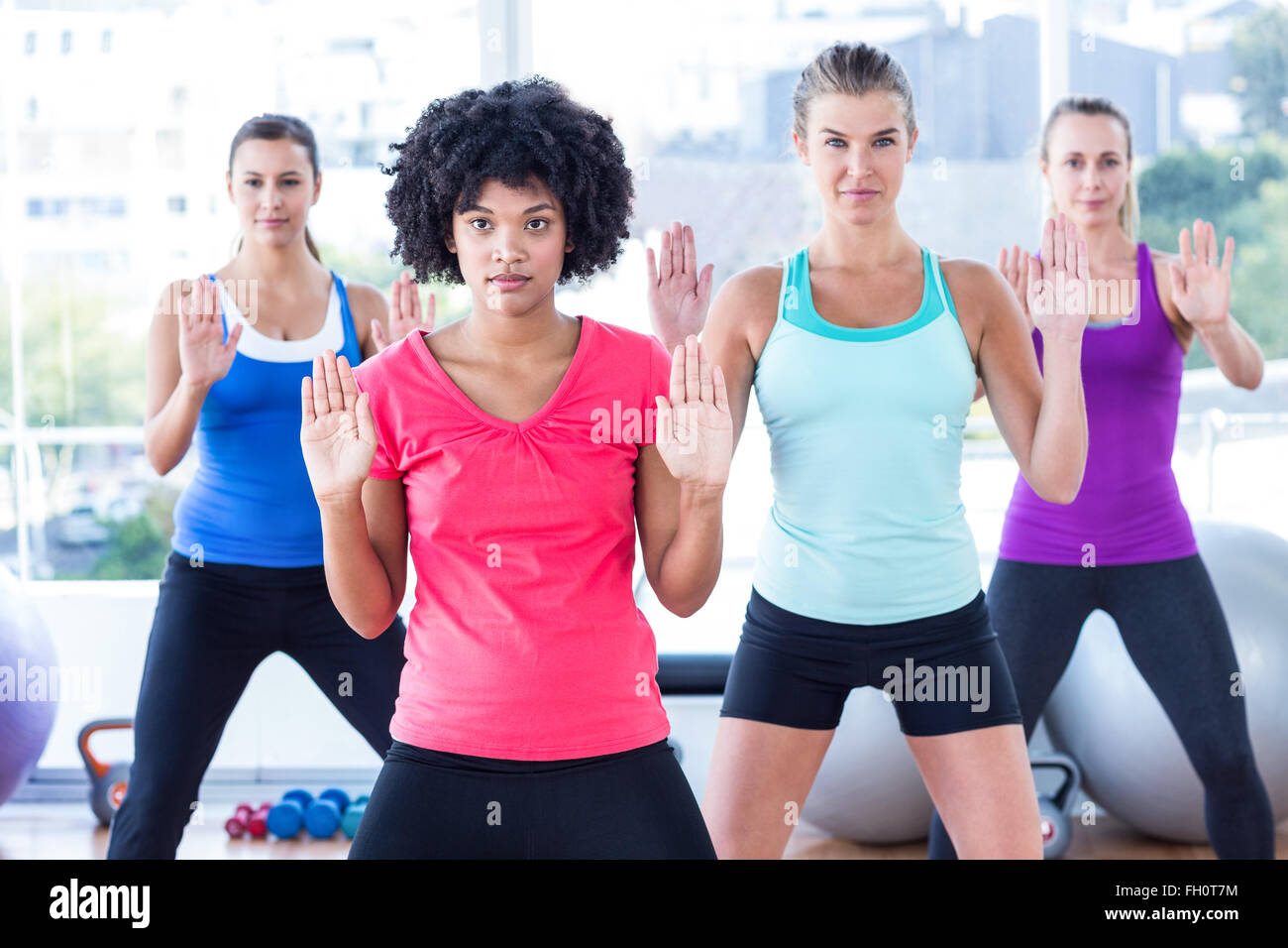 Women exercising with trainer Stock Photo - Alamy