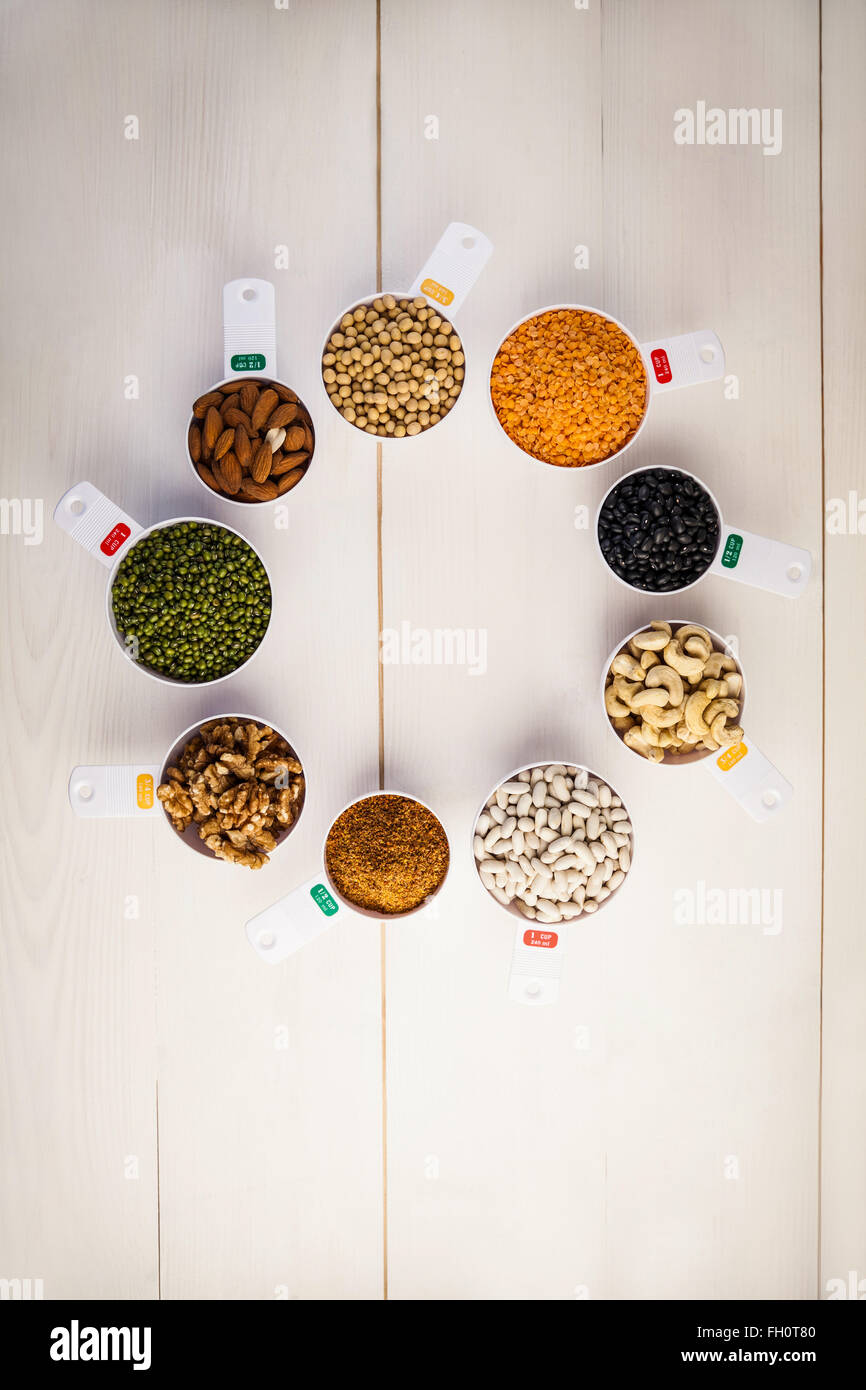Portion cups of healthy ingredients Stock Photo - Alamy