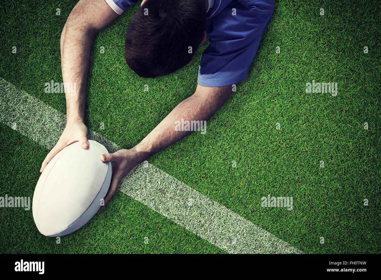 Composite image of a rugby player scoring a try Stock Photo - Alamy