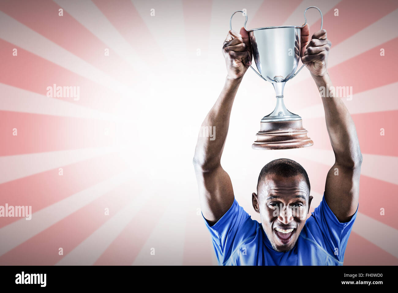 Composite image of portrait of happy athlete cheering while holding ...