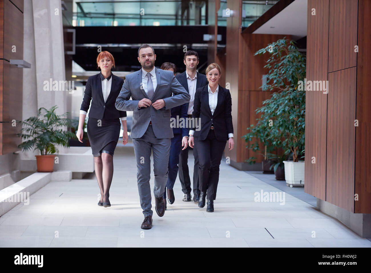 business people team walking Stock Photo - Alamy