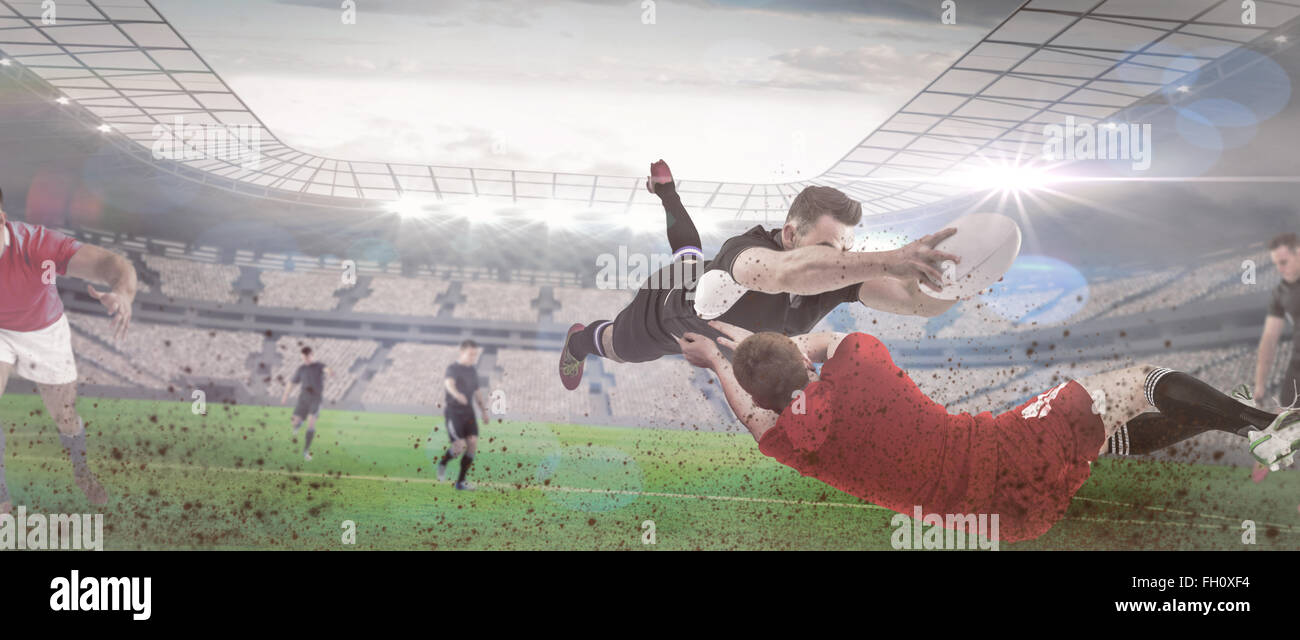 Composite image of a rugby player scoring a try Stock Photo - Alamy
