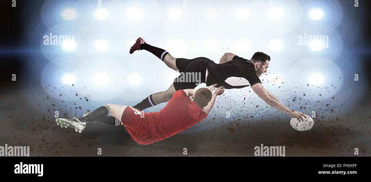 Composite image of a rugby player scoring a try Stock Photo - Alamy