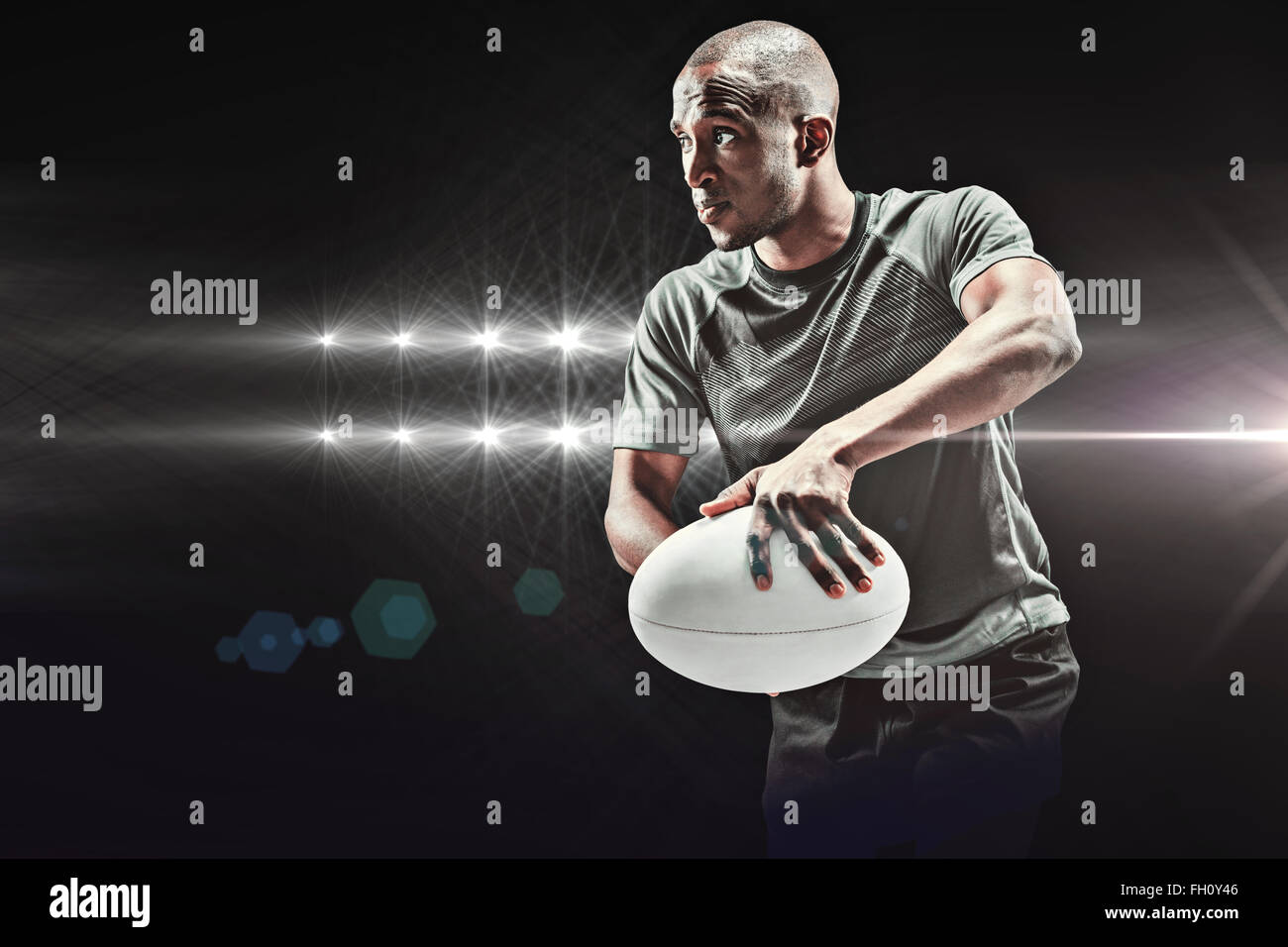 Composite image of determined rugby player in position to throw ball ...