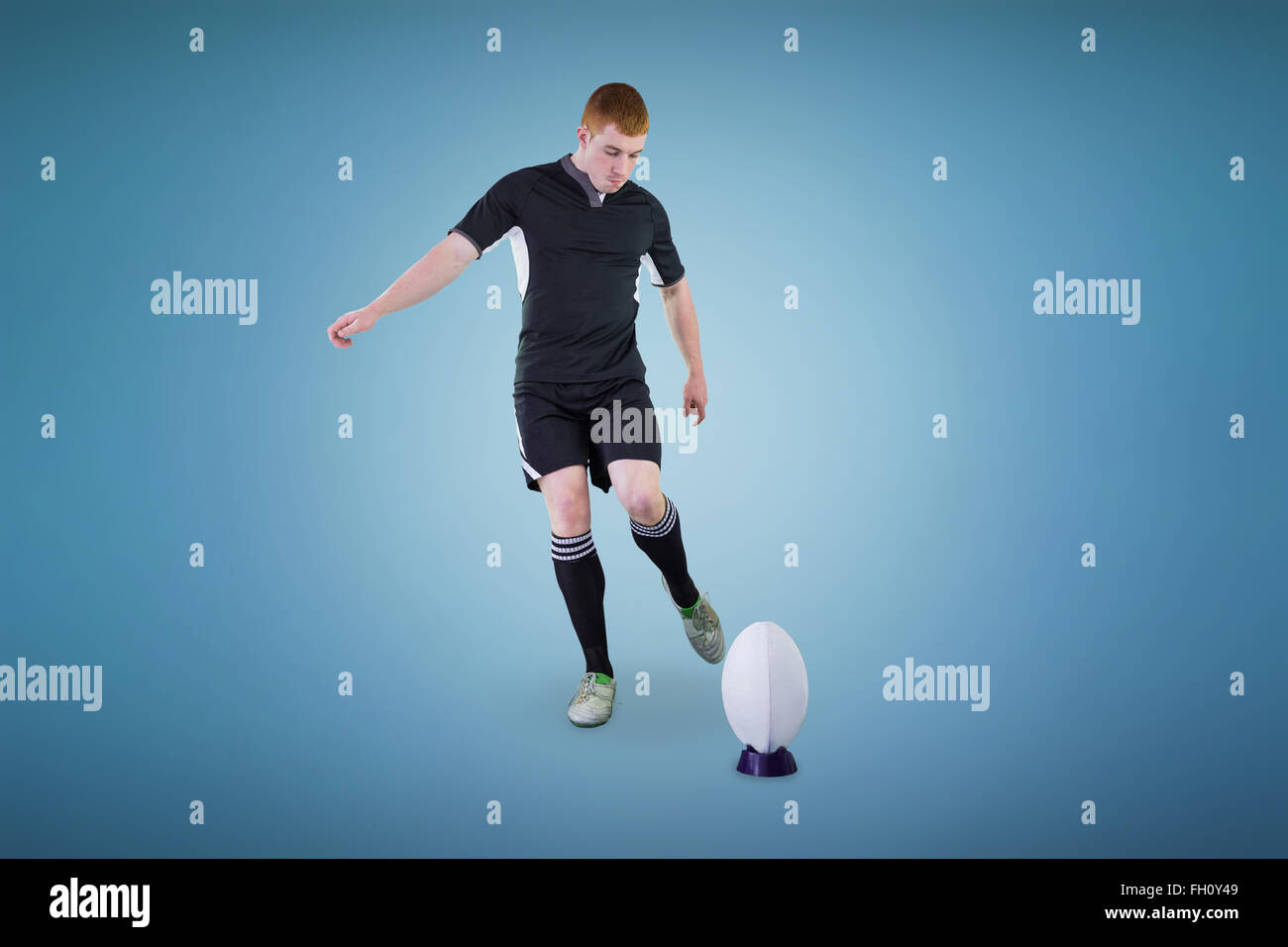 Composite image of rugby player doing a drop kick Stock Photo - Alamy