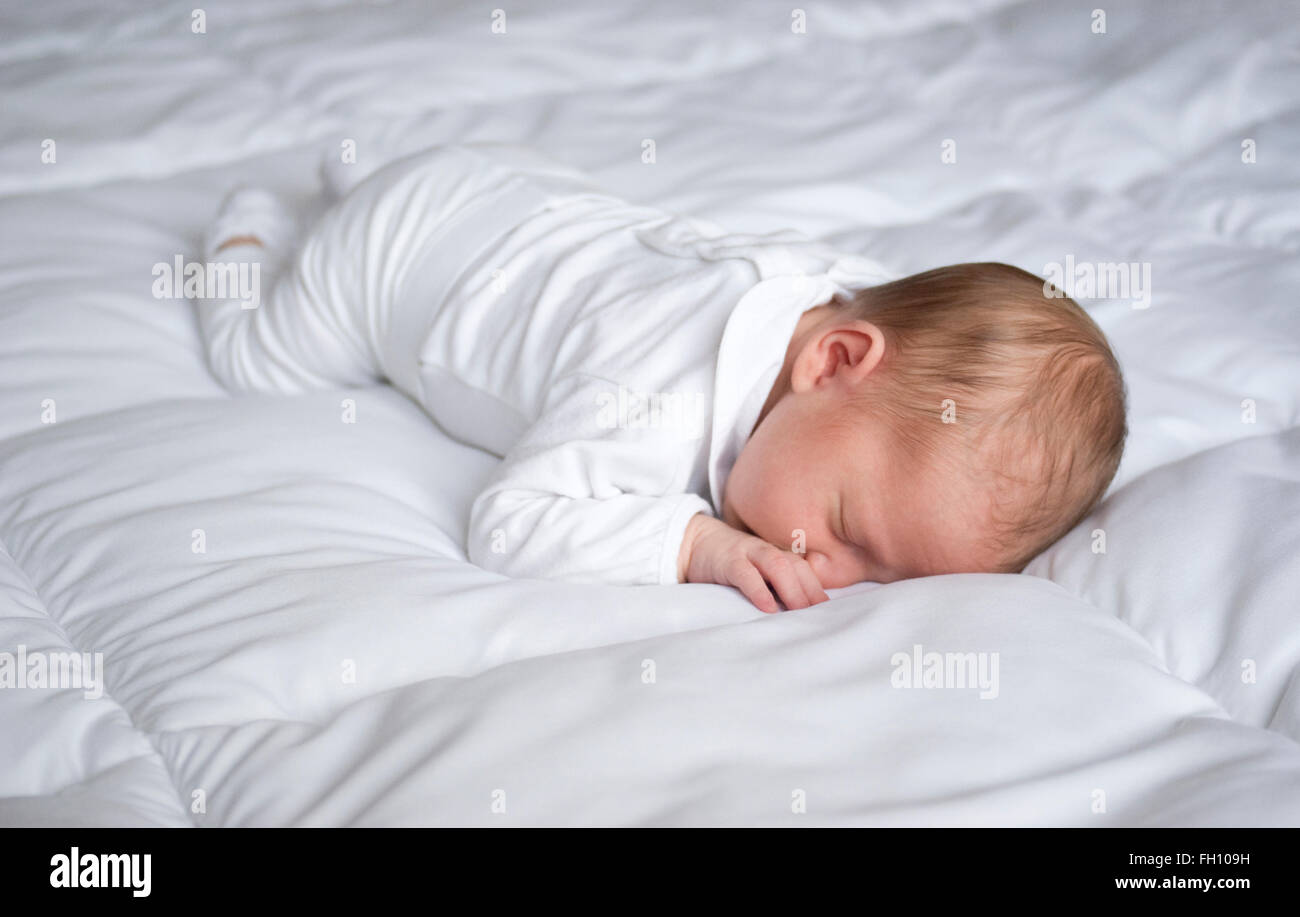 Sleeping newborn baby girl (only has 12 days from birth Stock Photo - Alamy